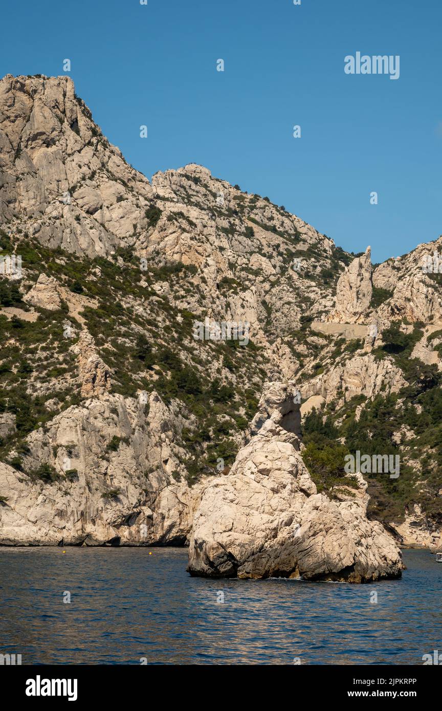 Limestone cliffs and blue sea near Cassis, boat excursion to Calanques ...