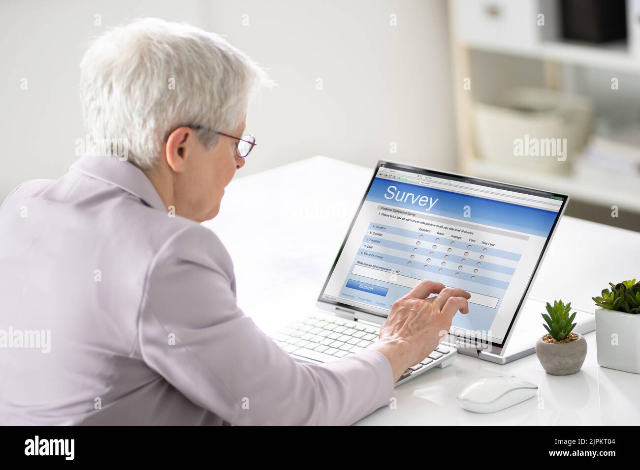 Online survey senior hi-res stock photography and images - Alamy