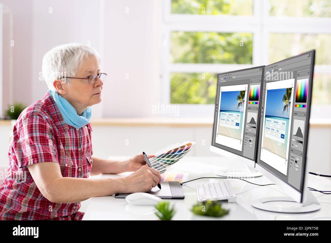 Website Graphic Designer Working In Office On Multiple Screens Stock ...