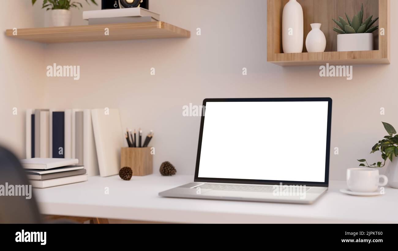 Simple white office desk or home woking table with notebook laptop ...