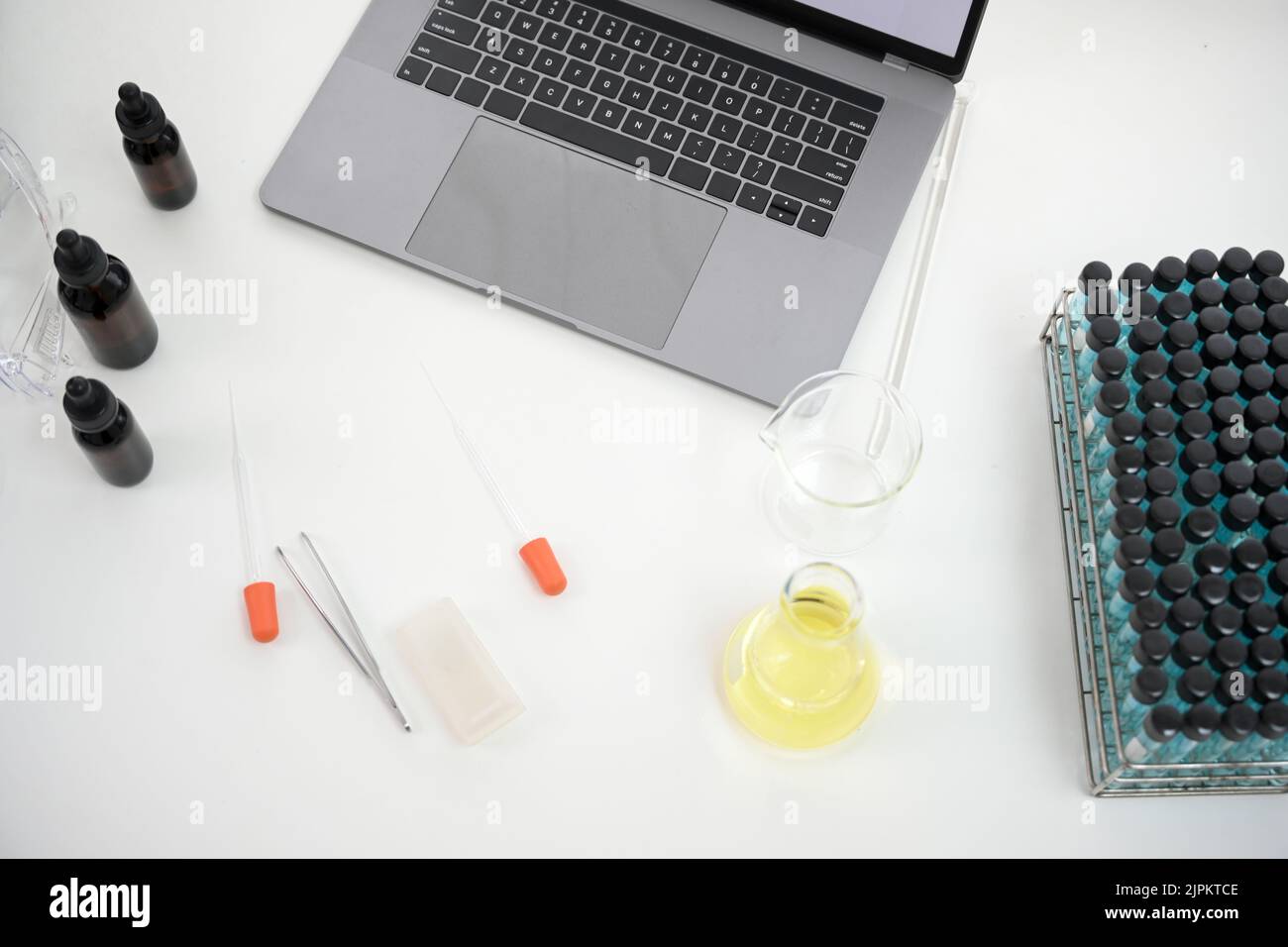 Overhead view, Scientist or chemist office desk workspace with portable ...