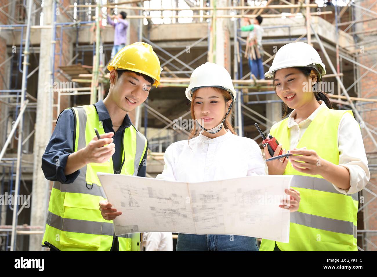 A professional Asian male civil engineer is explaining the building ...