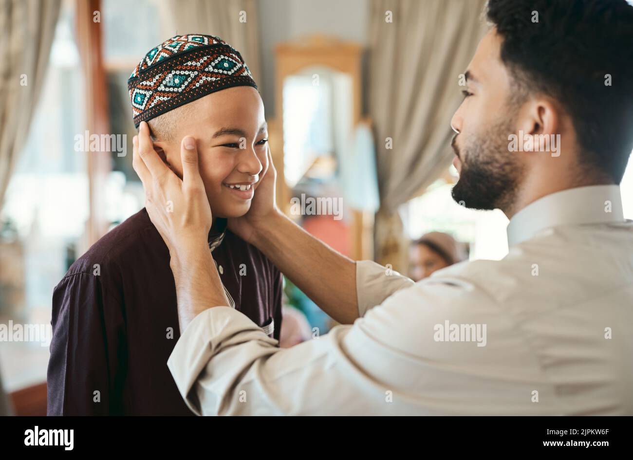 Affectionate, loving and caring Muslim father and son talking and ...