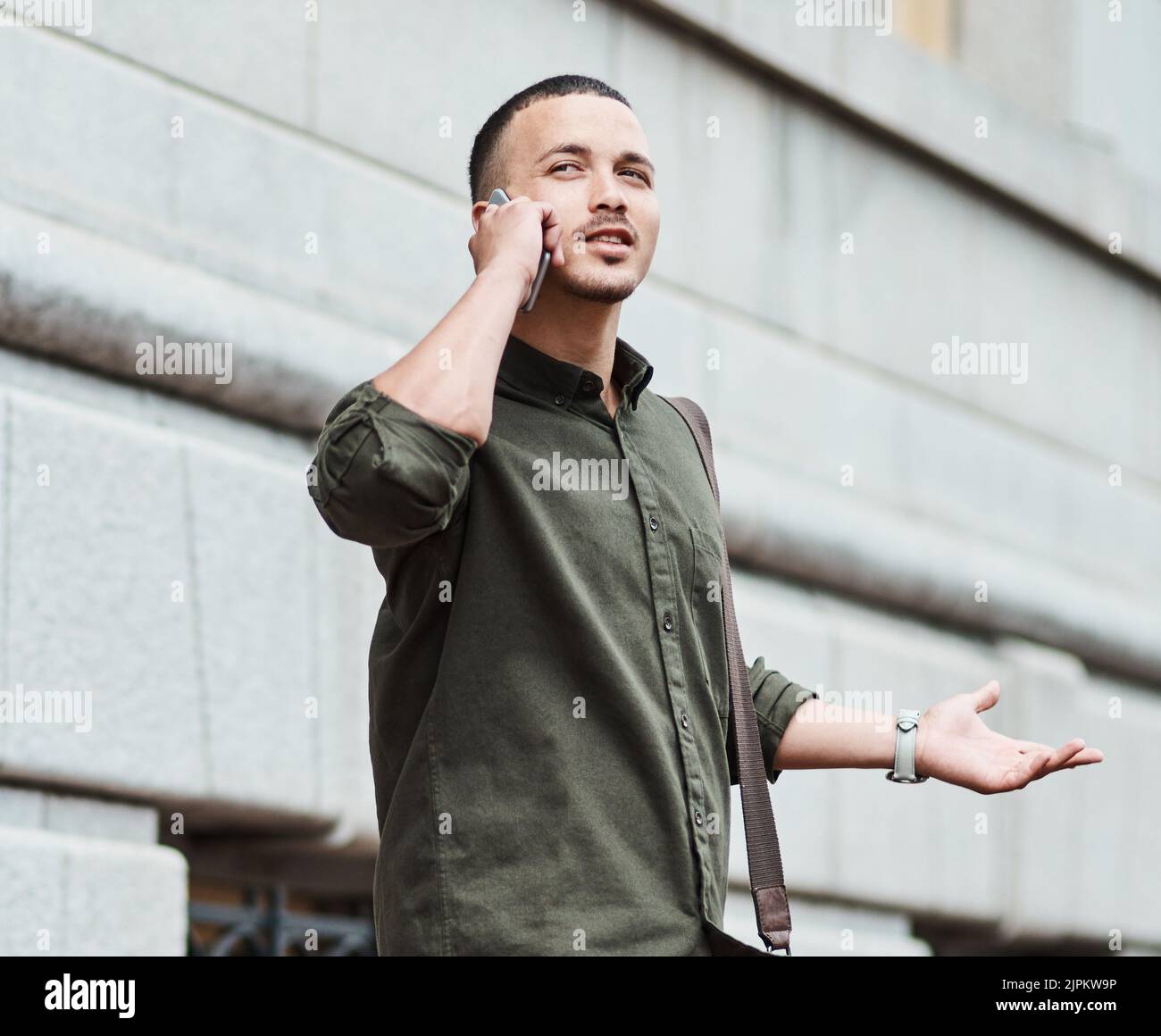 Lost man, traveler or tourist talking on a phone call asking for ...