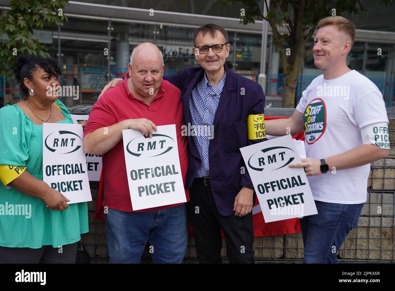 RMT assistant general secretary John Leach (second right) on the picket ...