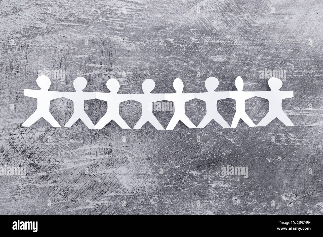 manpower and teamwork conceptual image, paper people chain with text on gray background Stock ...