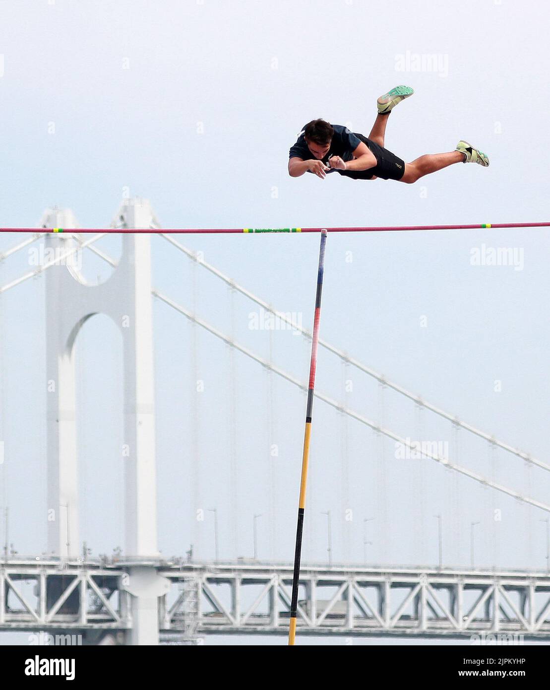 19th Aug, 2022. Int'l pole vault contest A junior contestant jumps over ...
