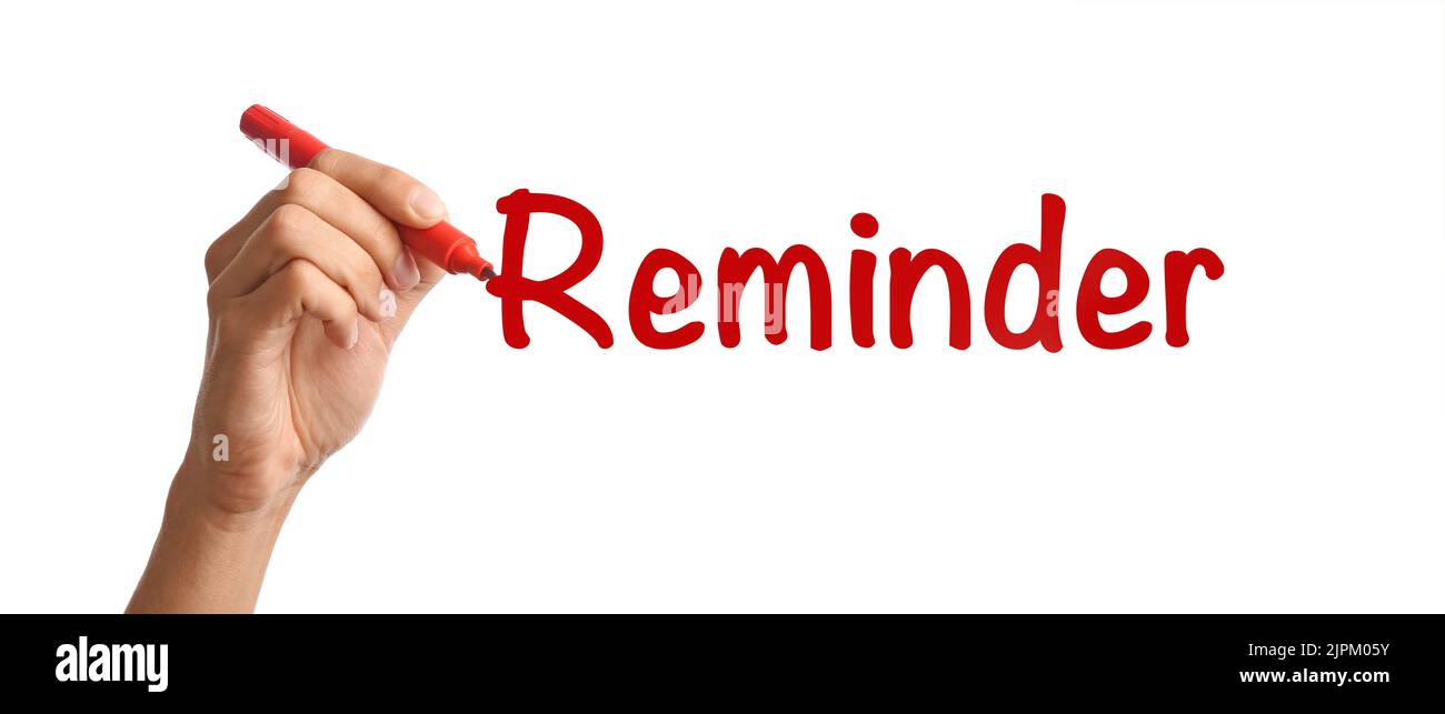 Man with marker writing word REMINDER on white background Stock Photo ...
