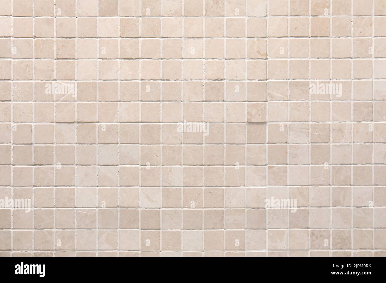 Beige tile wall as background, closeup Stock Photo - Alamy