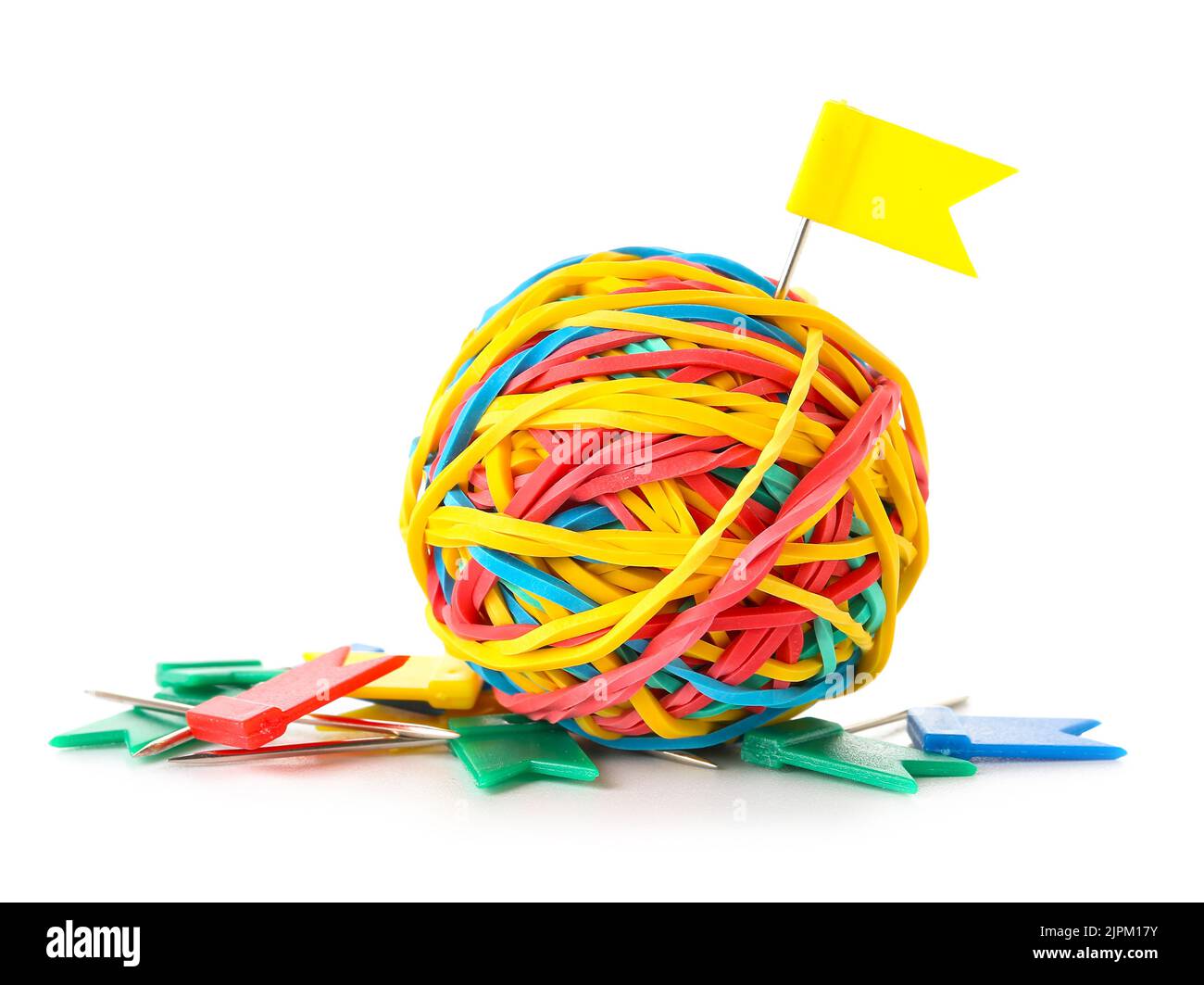 Colorful rubber band ball and paper pins on white background Stock ...
