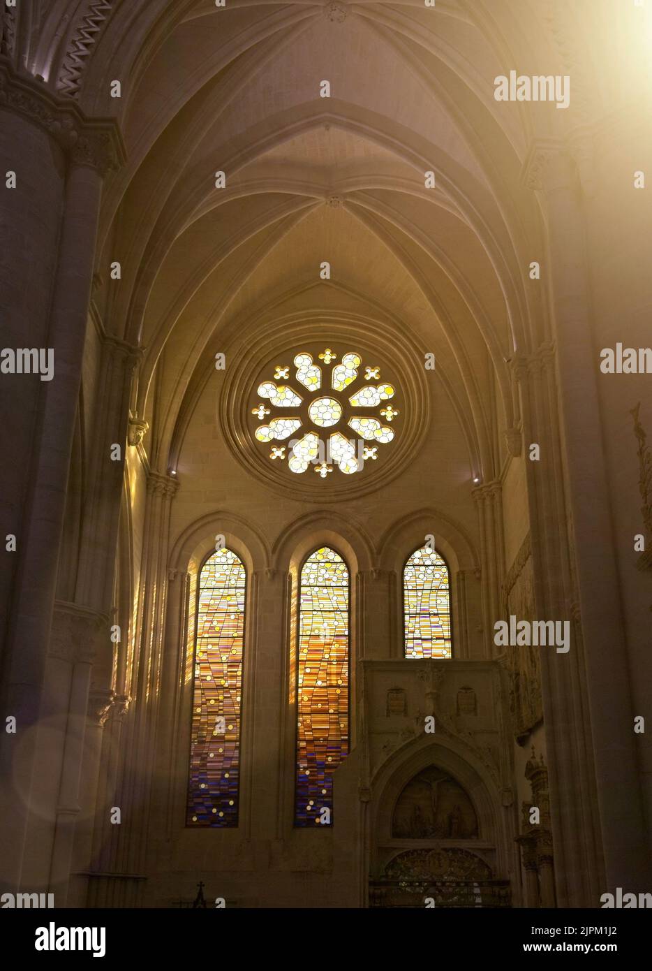 The light reflection through stained glass windows inside the cathedral ...