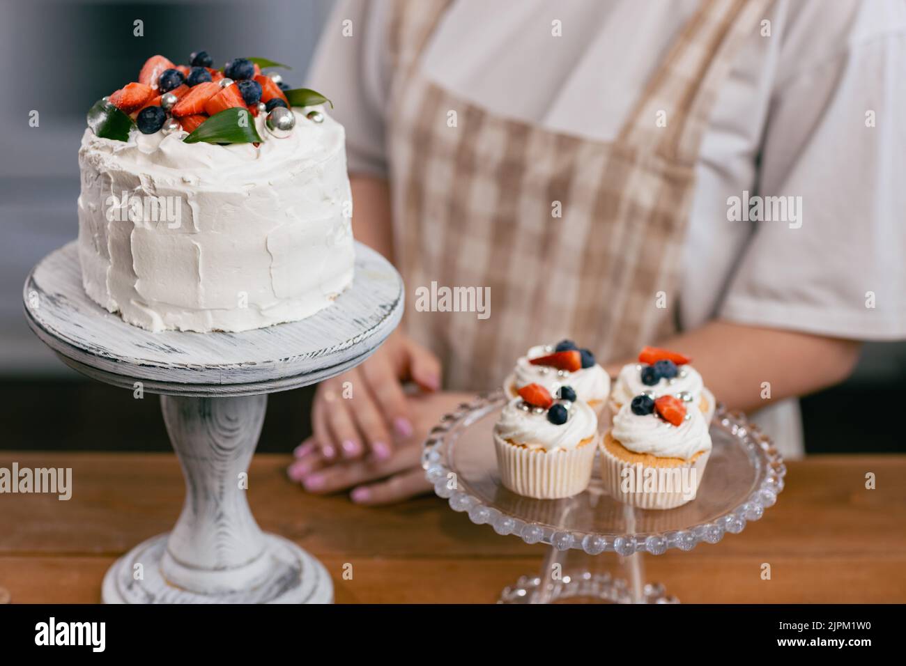 Dessert cake on kitchen table. Cakes cupcakes and sweet dessert Stock ...
