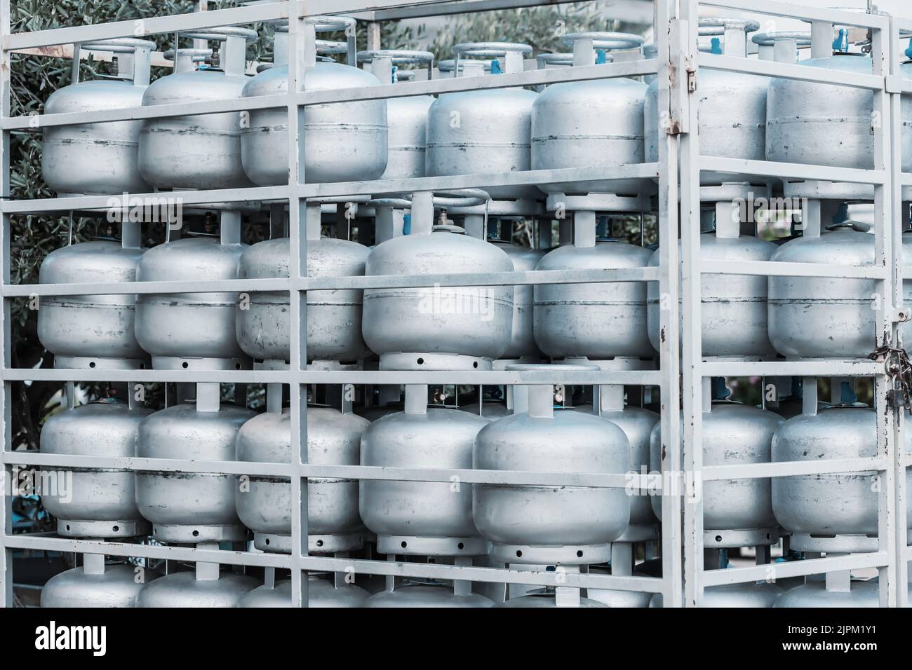 A lot of metal gas cylinders for cooking in households. Production and ...