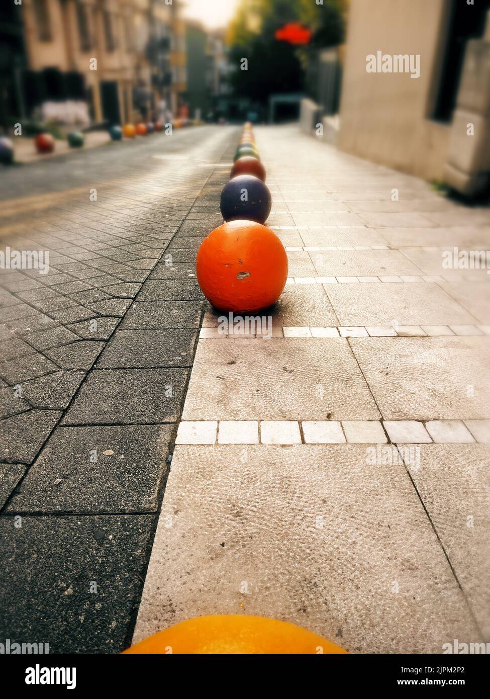 The street perspective full of color balls Stock Photo - Alamy