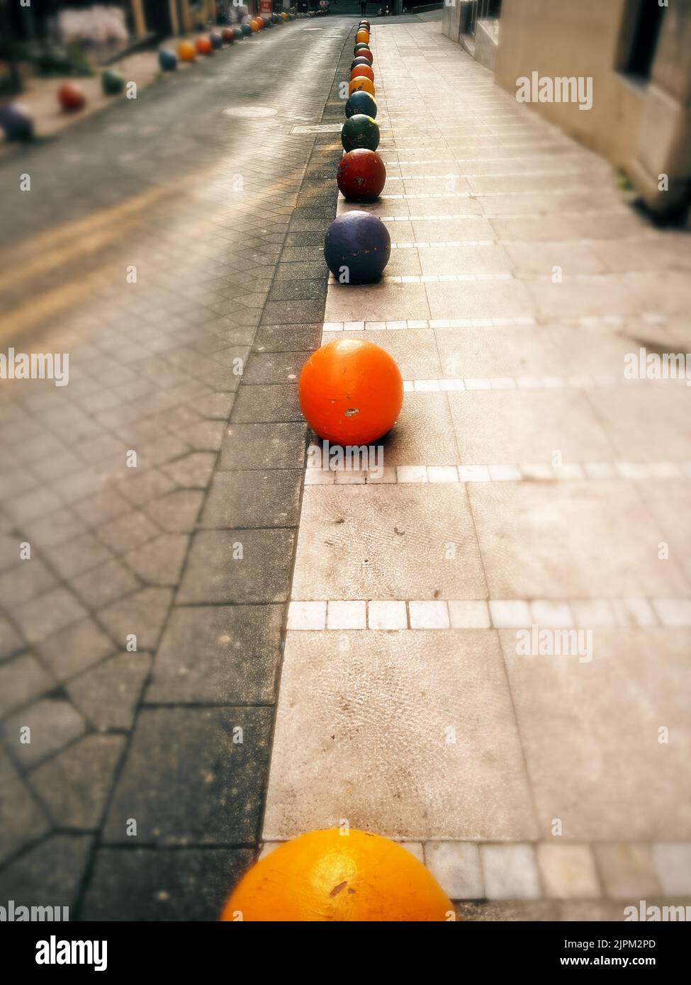 The street perspective full of color balls Stock Photo - Alamy