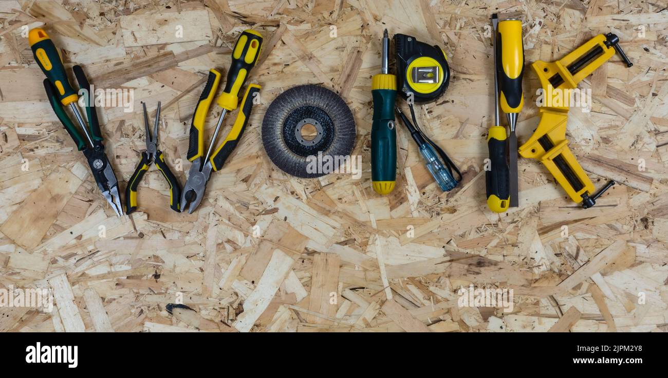 The word WORK made up of letters collected from construction tools ...