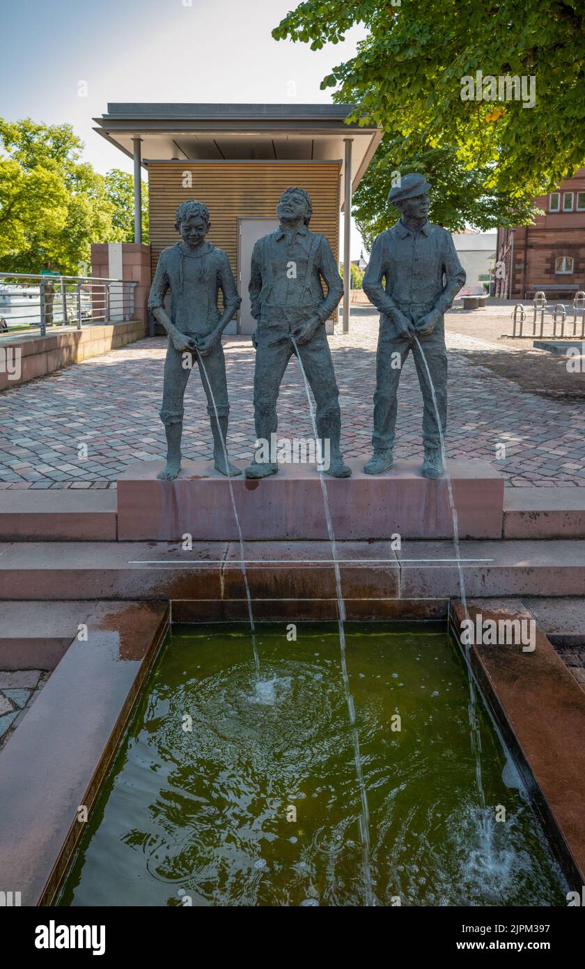Miltenberg, Germany - July 18, 2021: A sculptural group of boys peeing ...