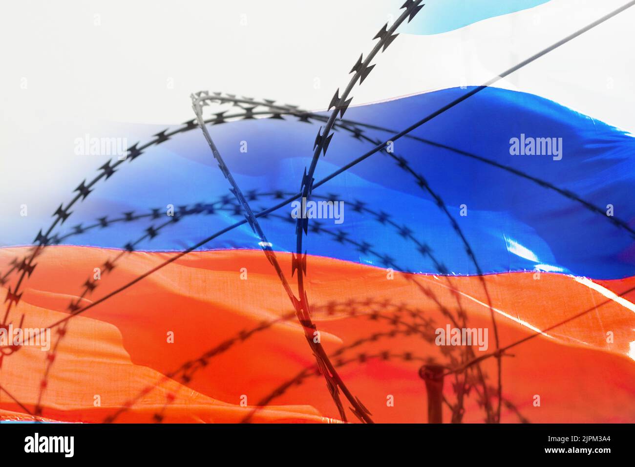 Flag of Russia on the background of barbed wire. War in Ukraine. Stop ...
