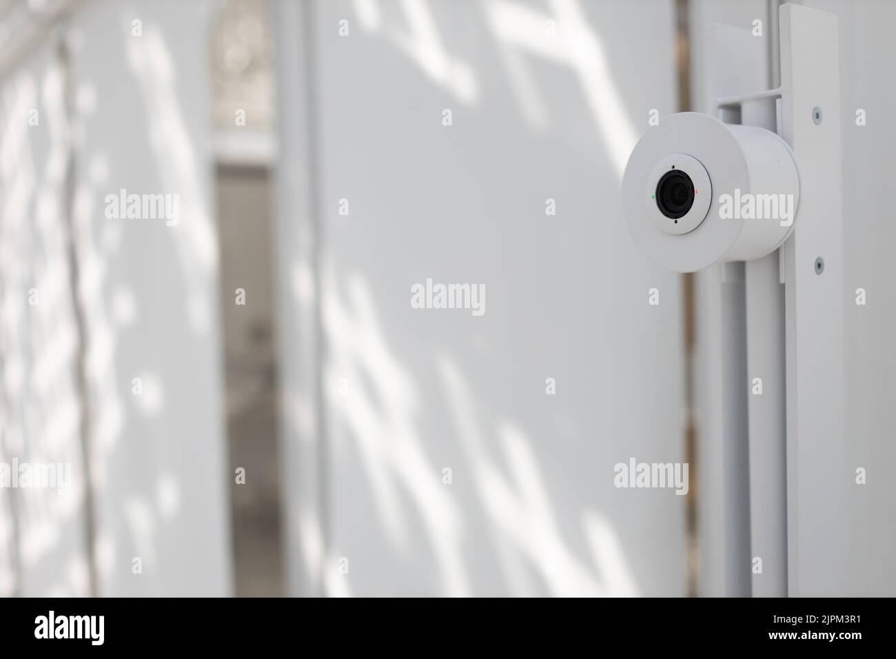 Face recognition system with camera in front of office in white ...