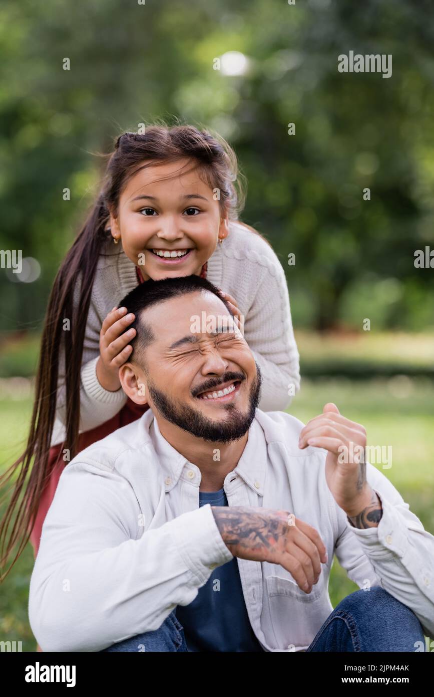 Asian kid playing hi-res stock photography and images - Alamy