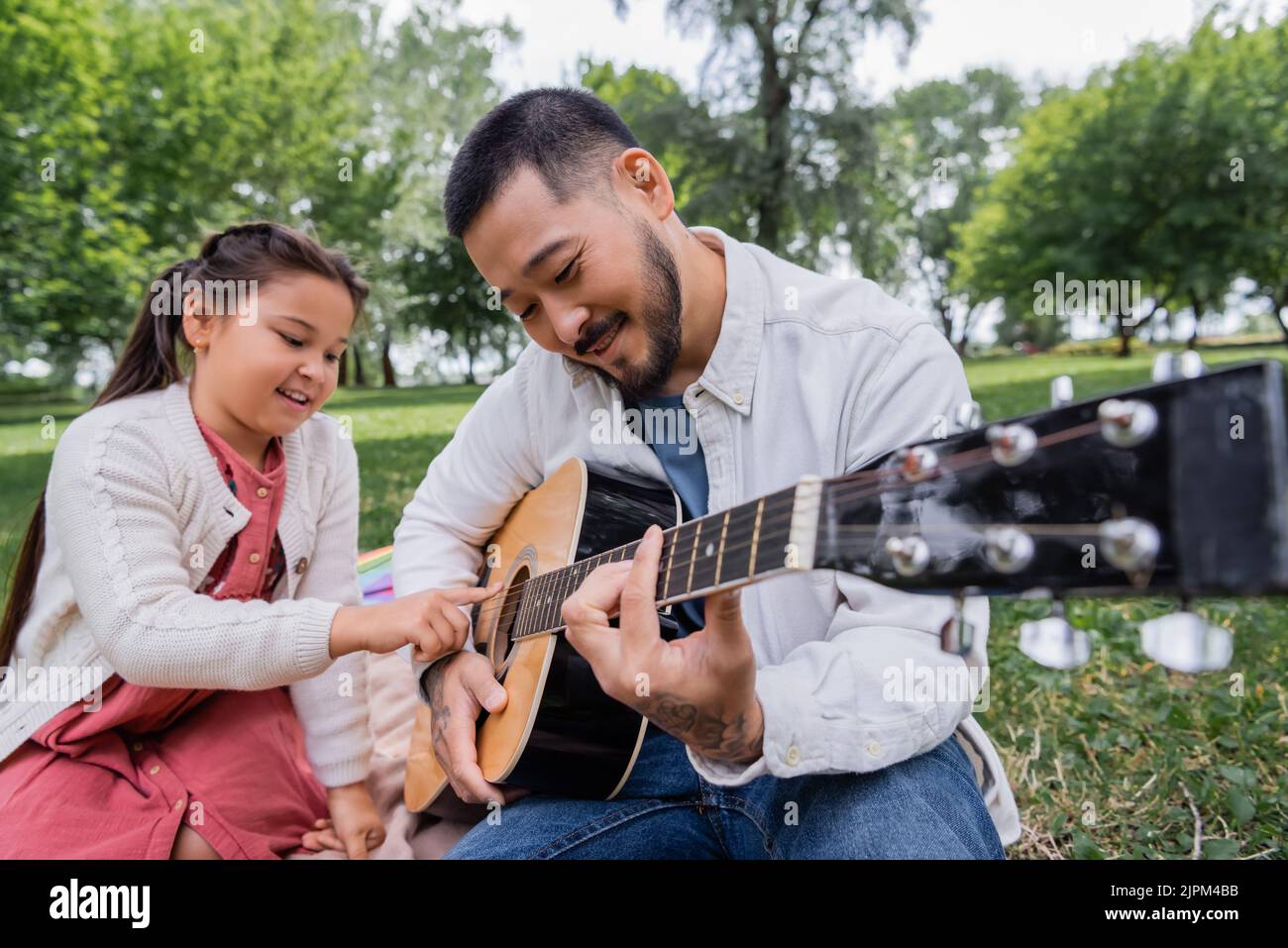 Asian guitarist hi-res stock photography and images - Alamy