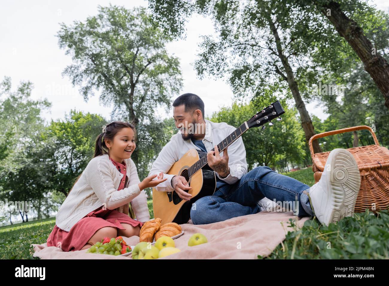 Child pointing at trees hi-res stock photography and images - Alamy