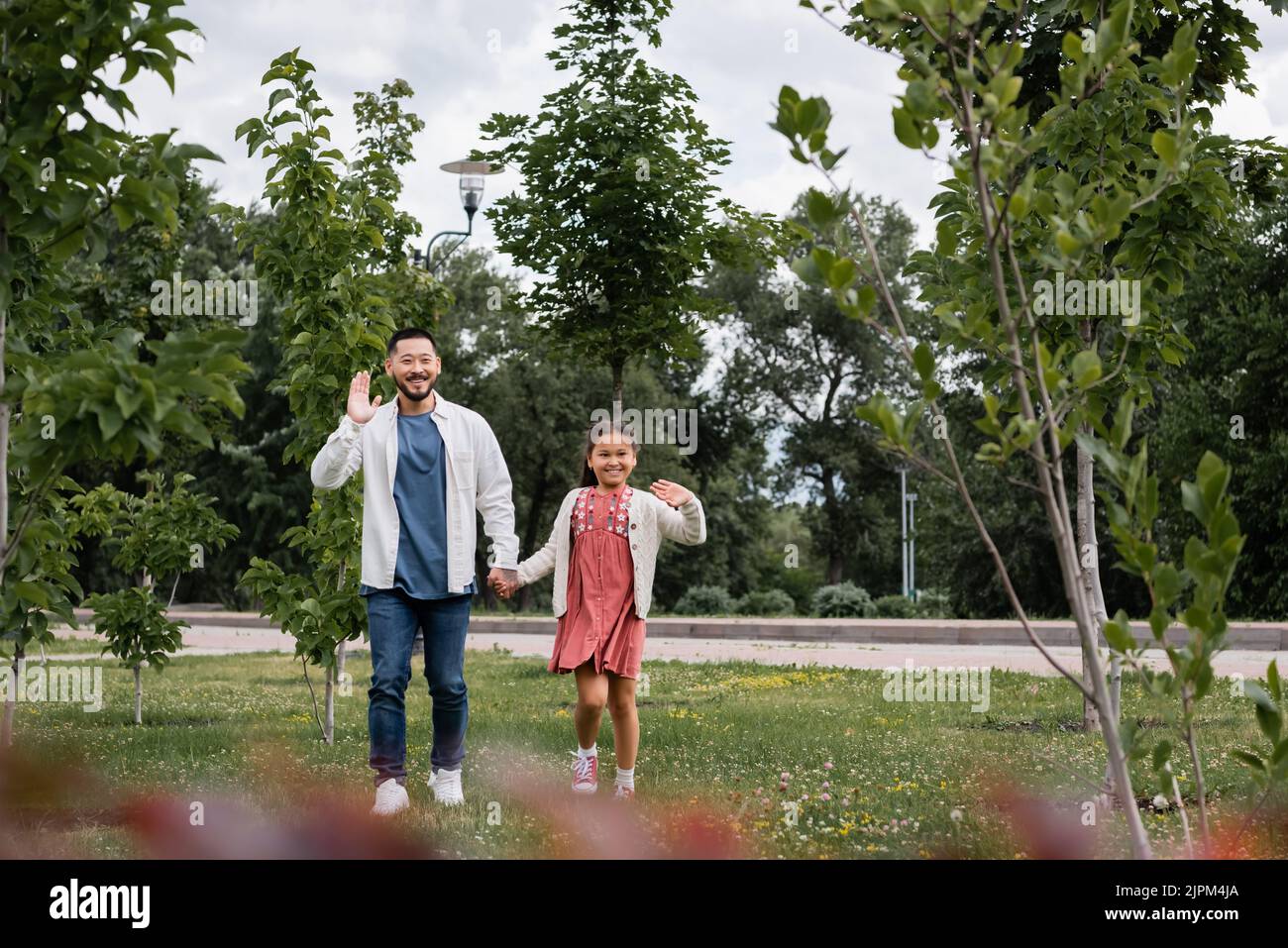 Daughter waving hi-res stock photography and images - Alamy