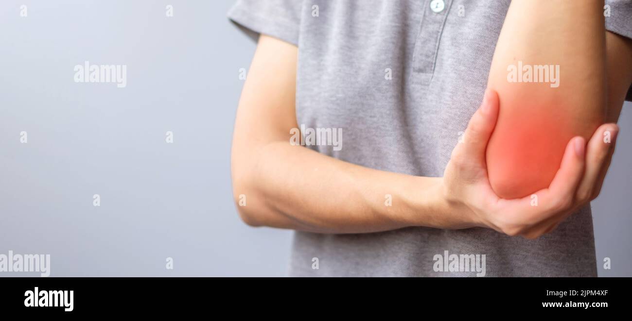 adult female with her muscle pain on gray background. Woman having ...