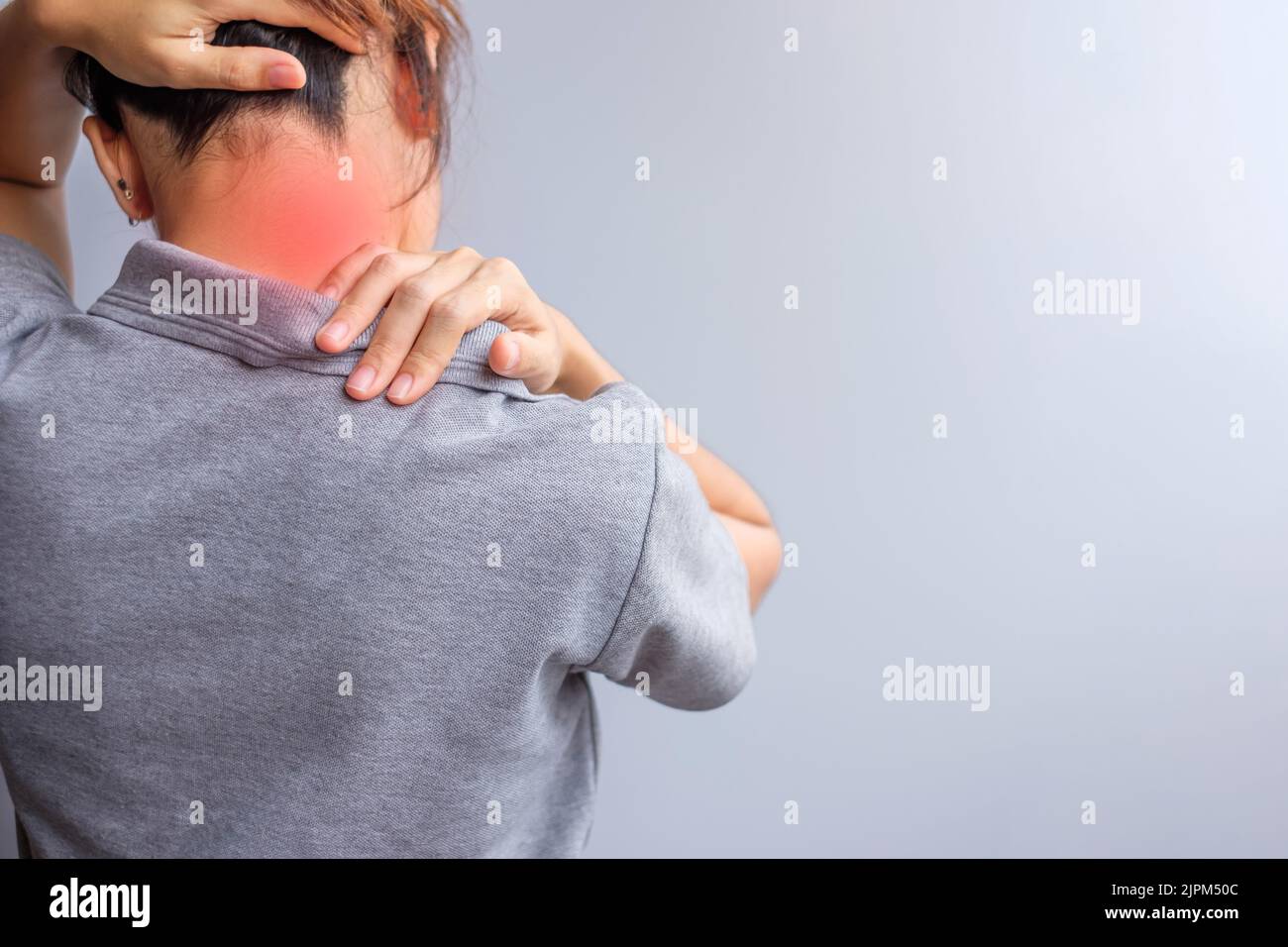 woman with her neck sprain, muscle painful during overwork. Girl having ...
