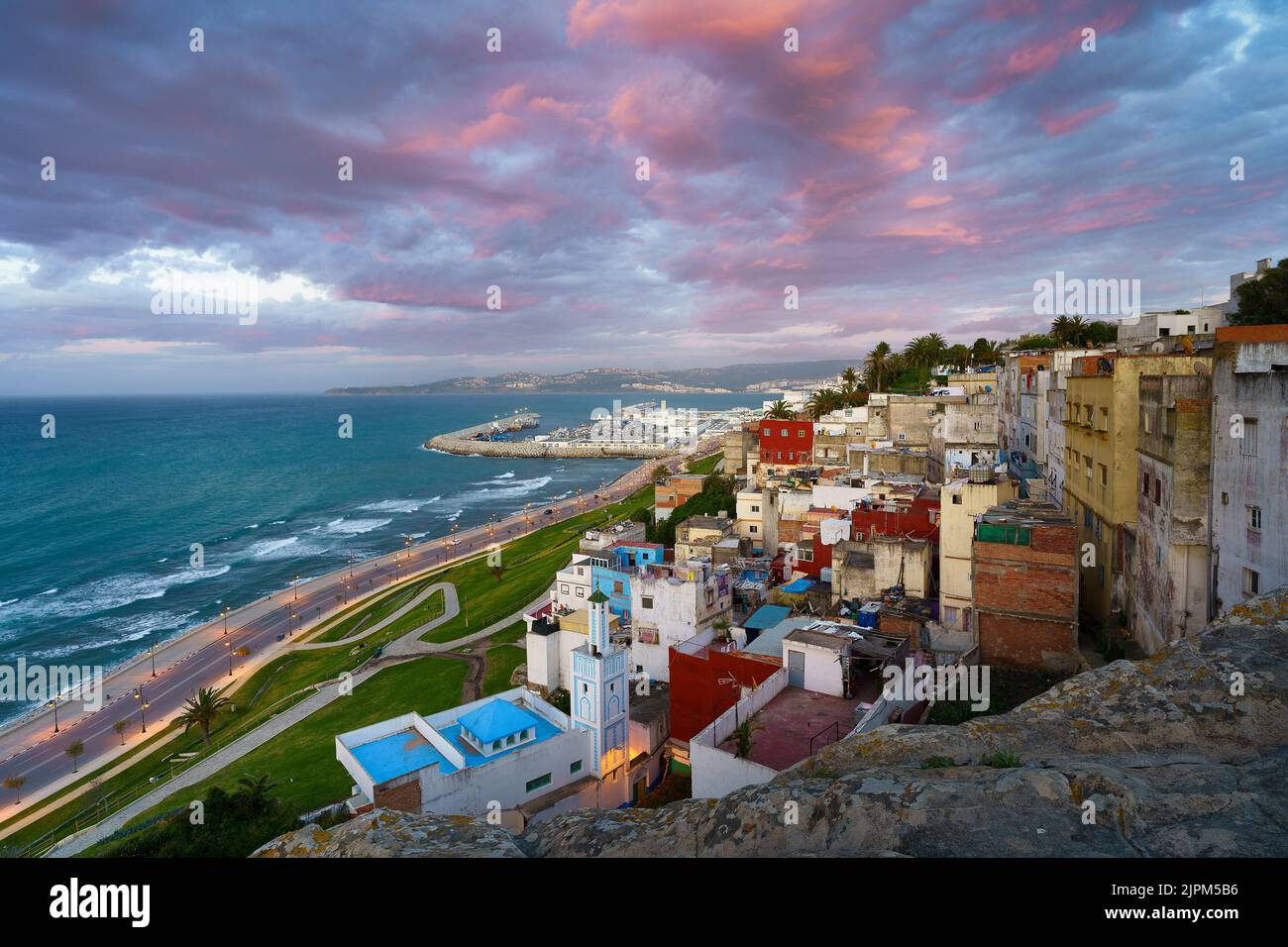 An aerial view of cityscape Tangier surrounded by buildings and water ...