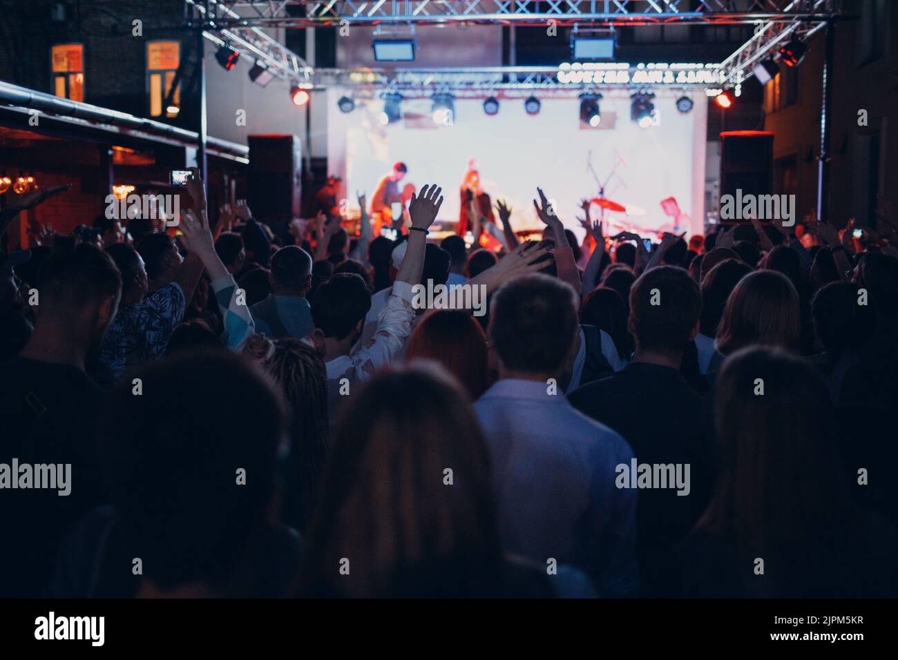 Concert night club outdoor rock group people crowd Stock Photo - Alamy