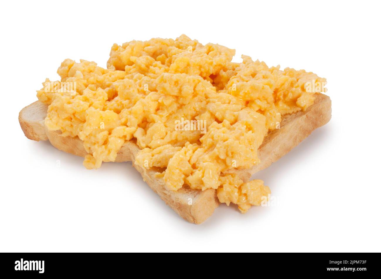 Studio shot of scrambled eggs on toast cut out against a white ...