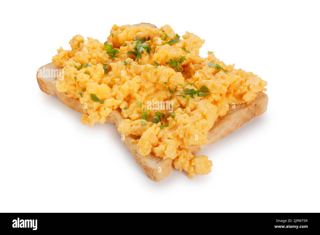 Studio shot of scrambled eggs on toast cut out against a white ...