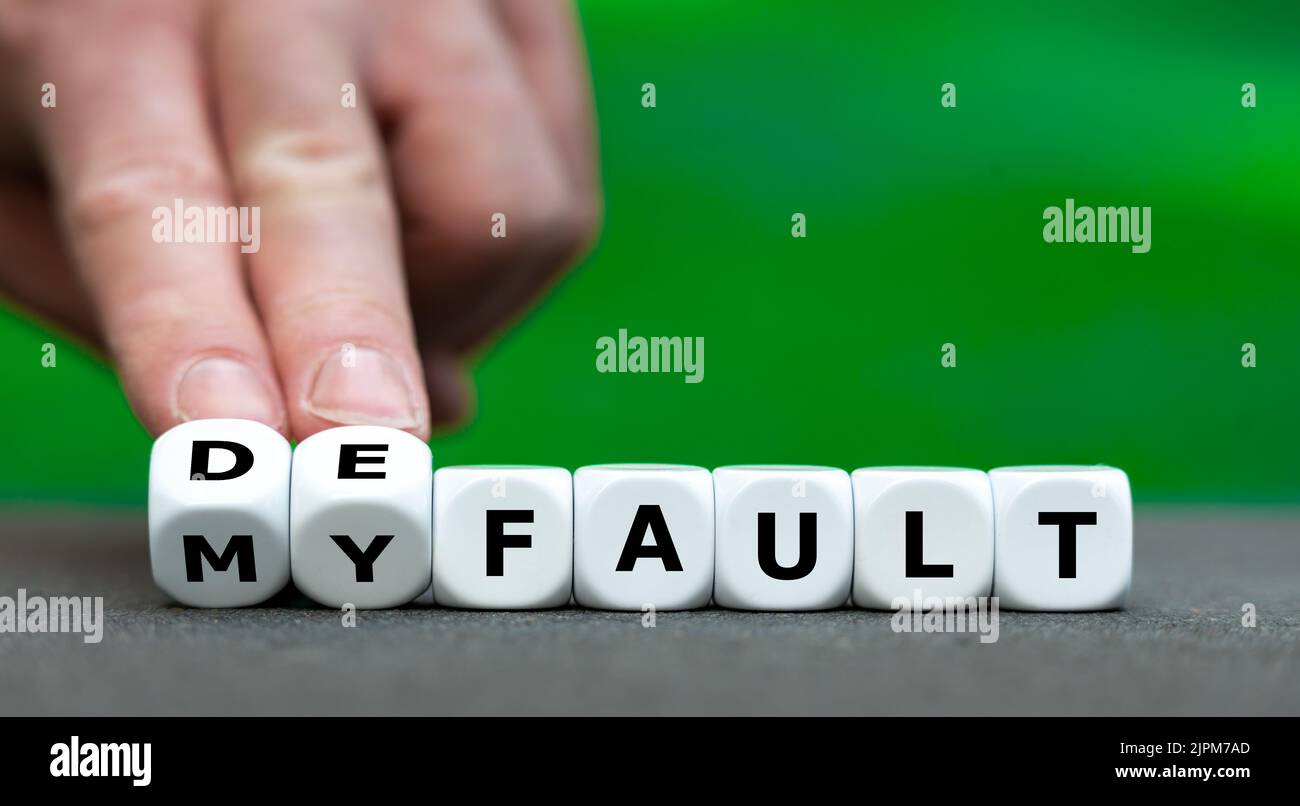 Hand turns dice and changes the expression "my fault" to "default Stock ...