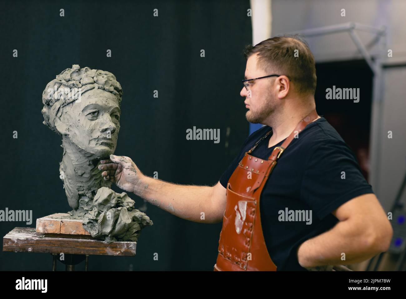 Man sculptor portrait sculpt bust clay human woman sculpture. Statue ...