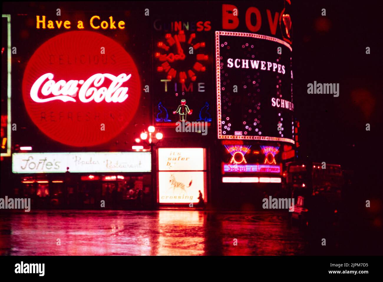 Neon advertising signs at night Piccadilly Circus, London, England, UK ...