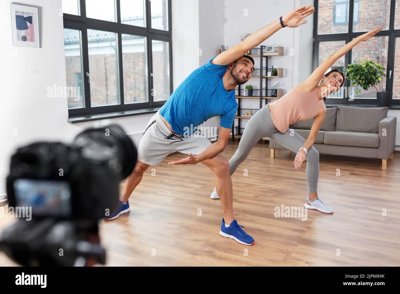 Young happy couple recording video hi-res stock photography and images ...