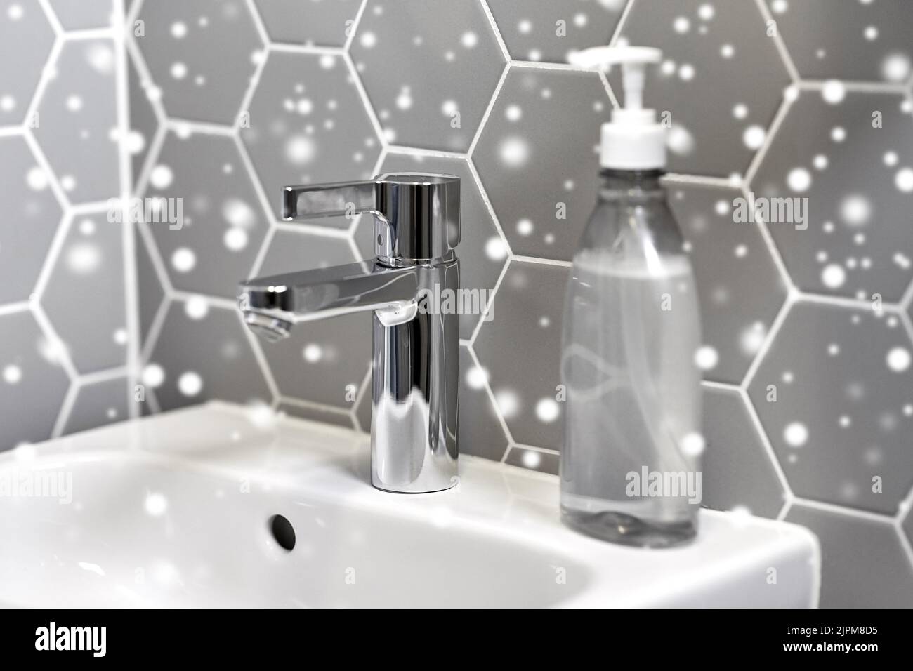 close up of water tap with liquid soap on sink Stock Photo - Alamy