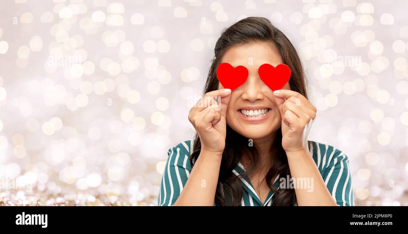 happy asian woman covering her eyes with red heart Stock Photo - Alamy