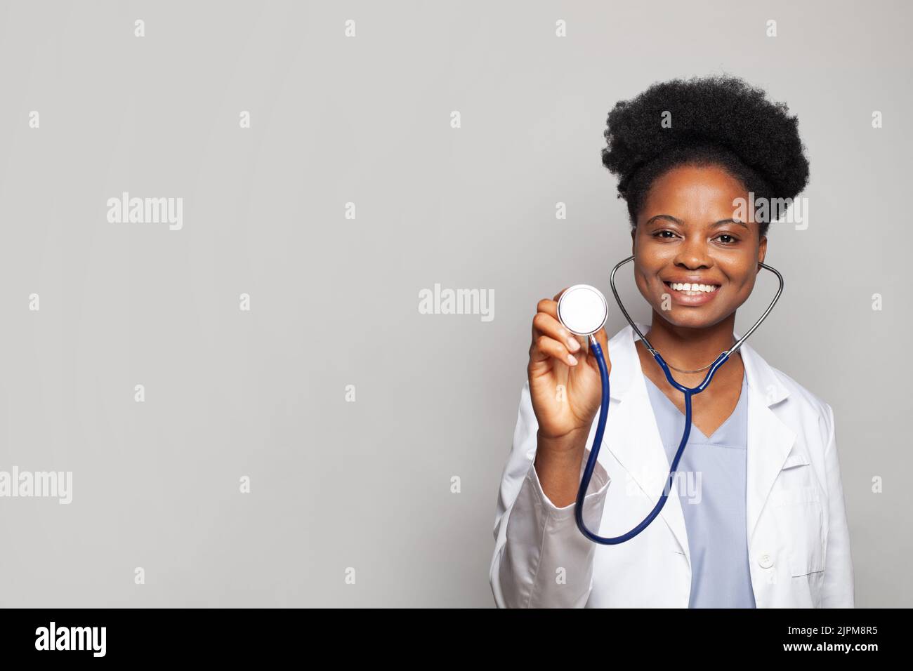 Beautiful female medical worker, doctor or practitioner with ...