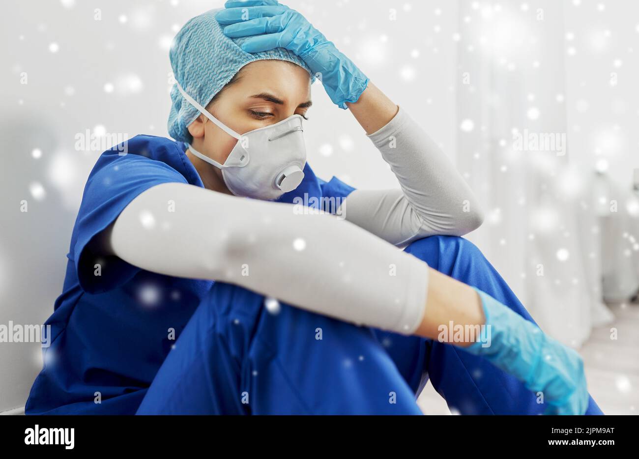 Doctor respirator tired hi-res stock photography and images - Alamy