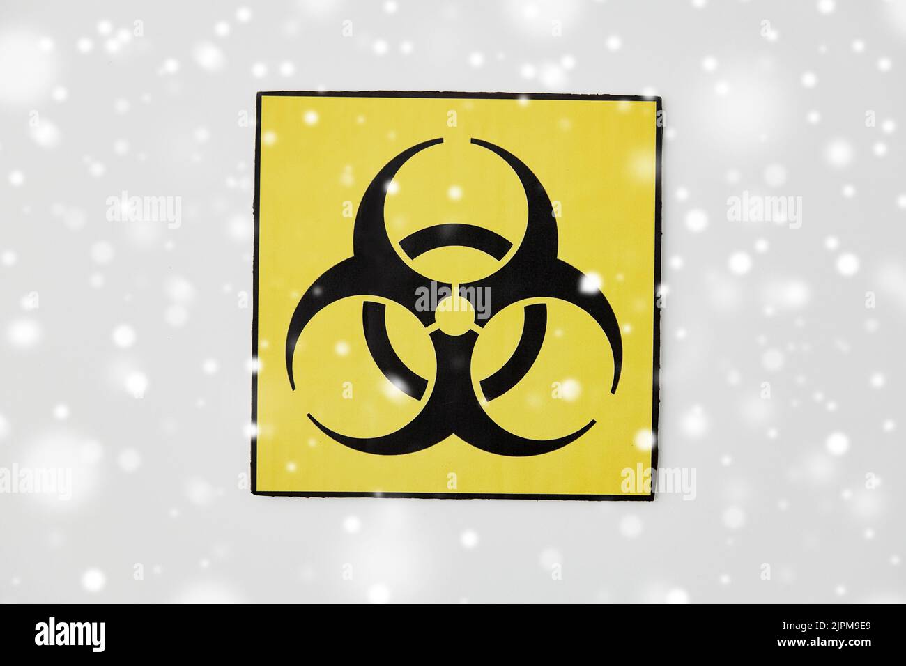 biohazard caution sign on white background Stock Photo - Alamy