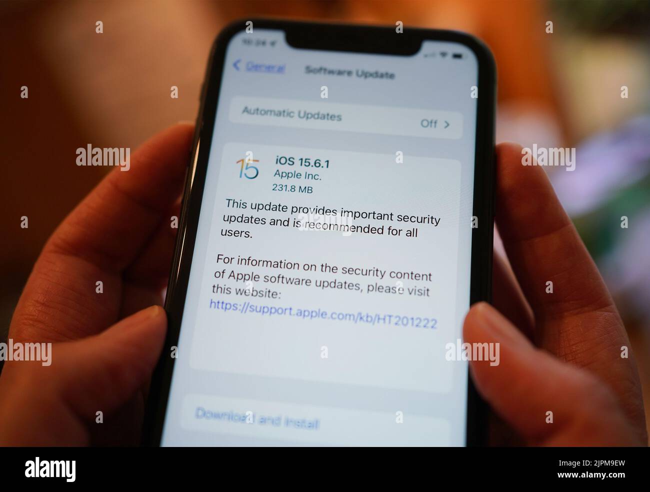 A message notifying users of an important security update is displayed on an iPhone 11, in ...