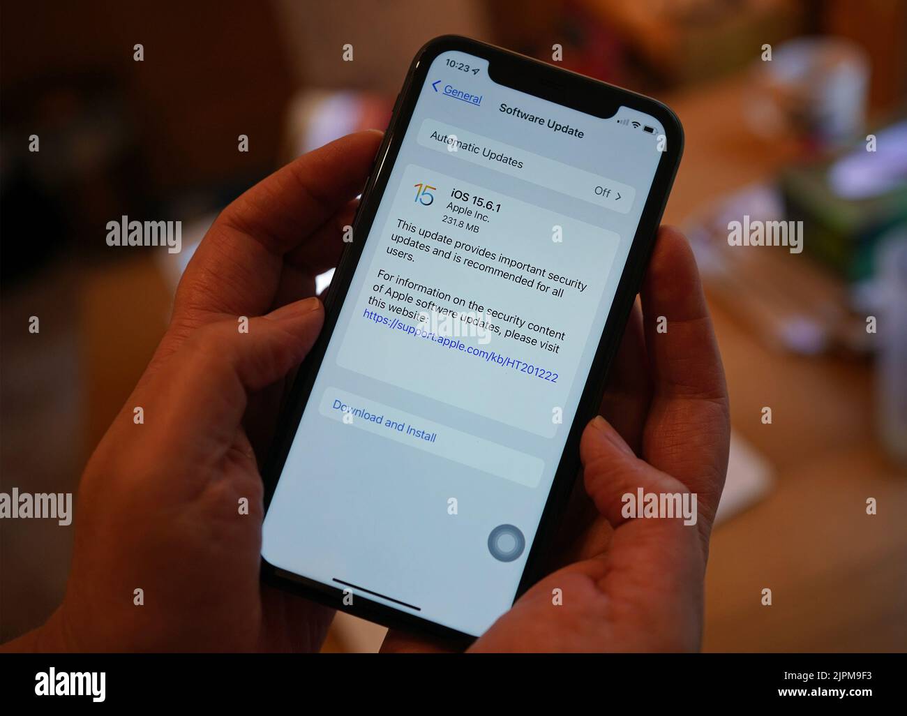 A message notifying users of an important security update is displayed on an iPhone 11, in ...