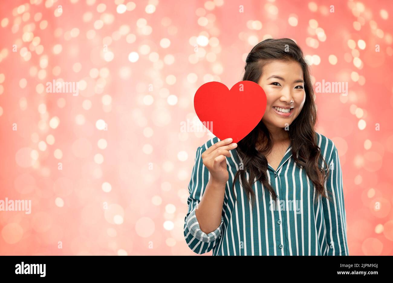 happy asian woman with red heart Stock Photo - Alamy