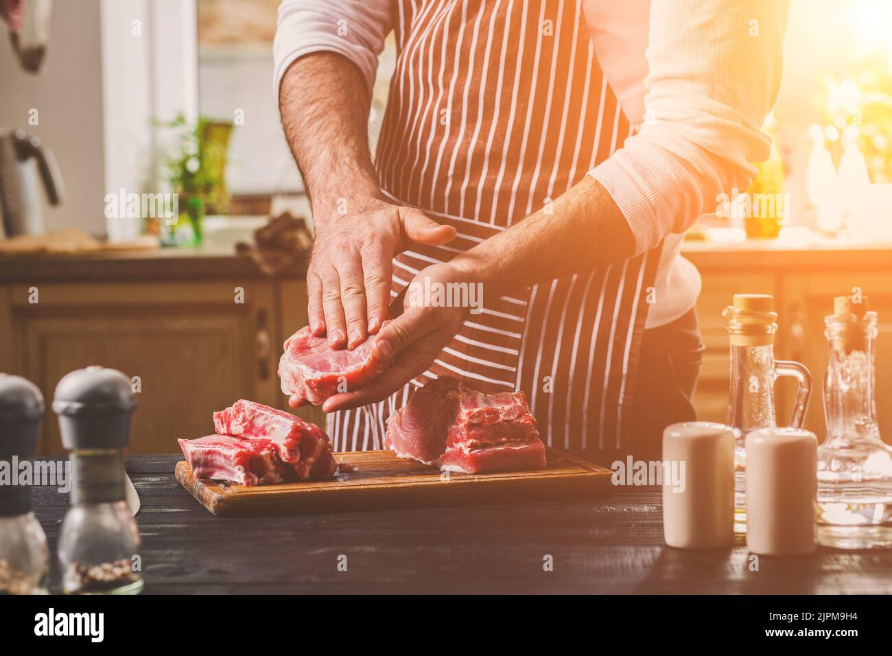 Preparation of dinner. Cooking, processing of meat beef, tenderloin ...