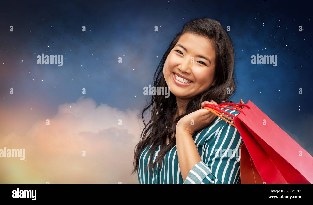 Happy asian woman shopping hi-res stock photography and images - Alamy