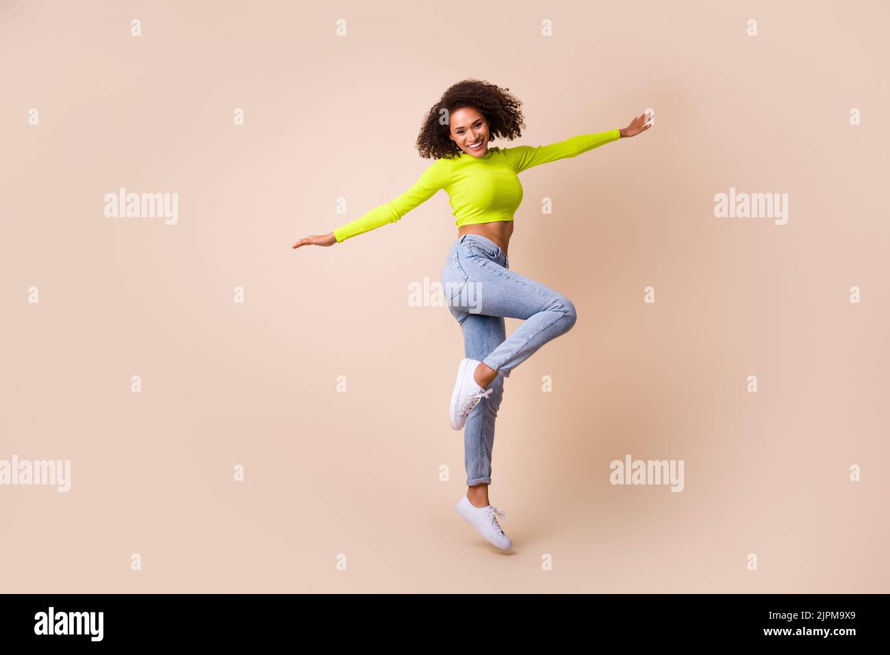 Full size photo of young excited woman wear yellow top sporty figure ...