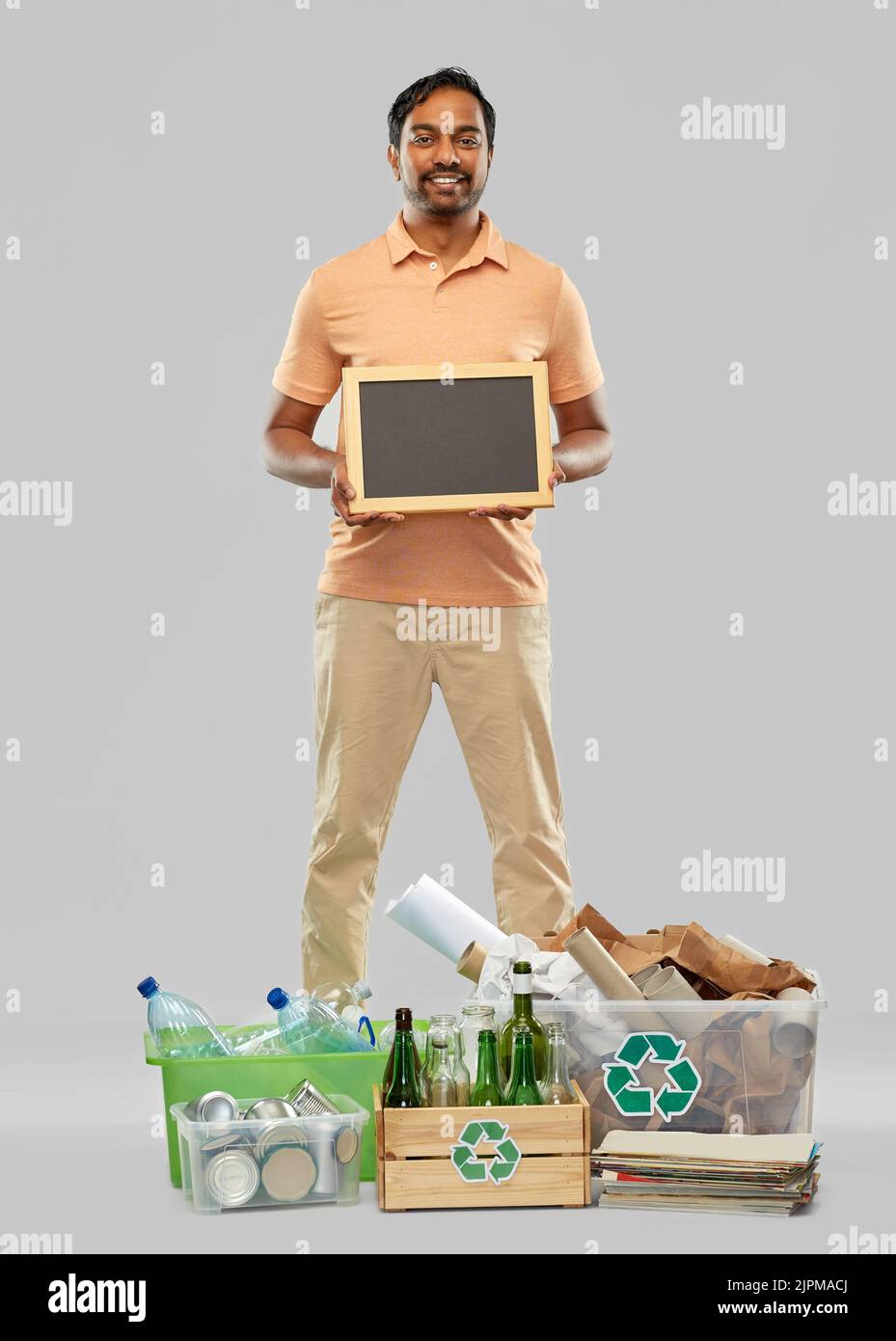 smiling man sorting paper, glass and plastic waste Stock Photo - Alamy
