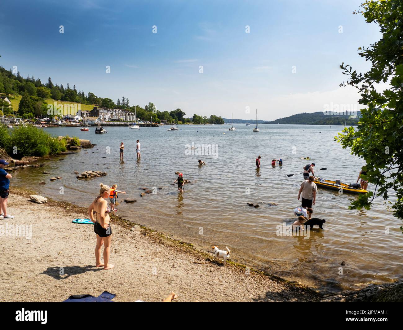 Crowds cool off in Lake Windermere in the mid July 2022 heatwave, when ...